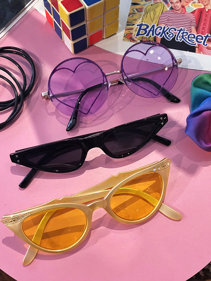 Heart-shaped purple shades that would make Elton John jealous sit alongside cat-eyes sharp enough to cut through any fashion emergency.
