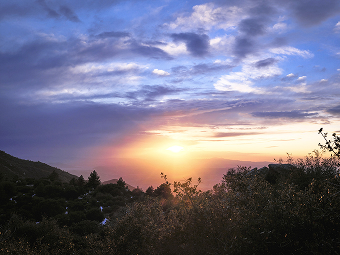 Mother Nature's grand finale&mdash;a sunset that turns the sky into a watercolor masterpiece, painting the mountains in shades no Instagram filter could improve.