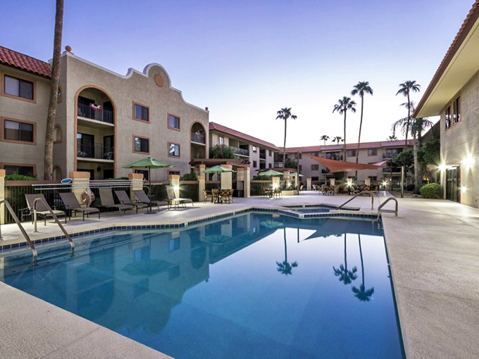 The community pool: where "water aerobics" is just a fancy term for "gossiping while moving your arms occasionally."