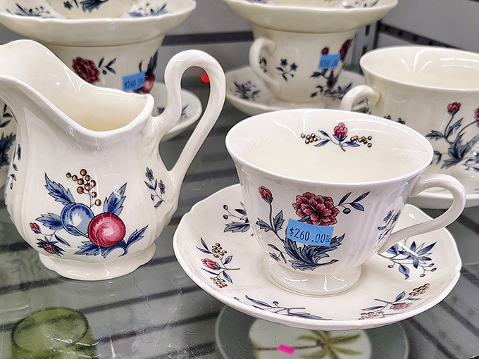 Delicate porcelain with blue and red floral designs whispers of tea parties past and future&mdash;someone's "grandma's best china" awaiting a second act.