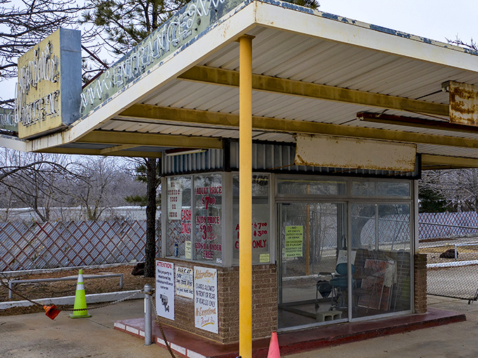 Winter slumber at the ticket booth—a hibernating cinema treasure waiting for warmer nights when Oklahoma families will return for another season.