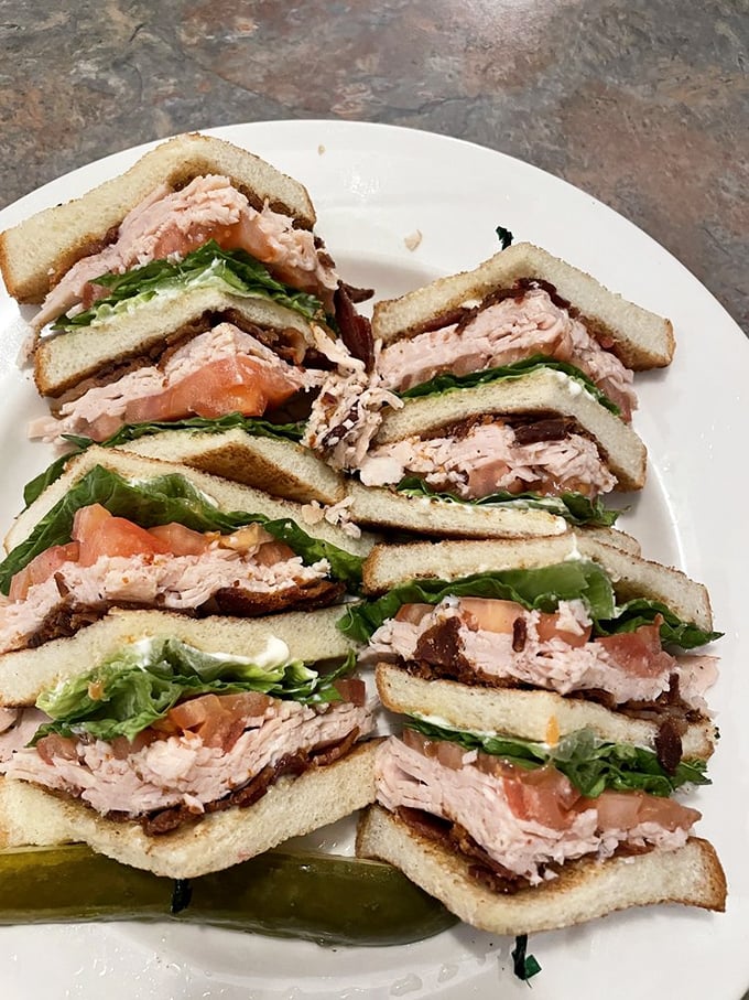This turkey club isn't just stacked &ndash; it's architected. Three stories of sandwich engineering that would make Frank Lloyd Wright jealous.