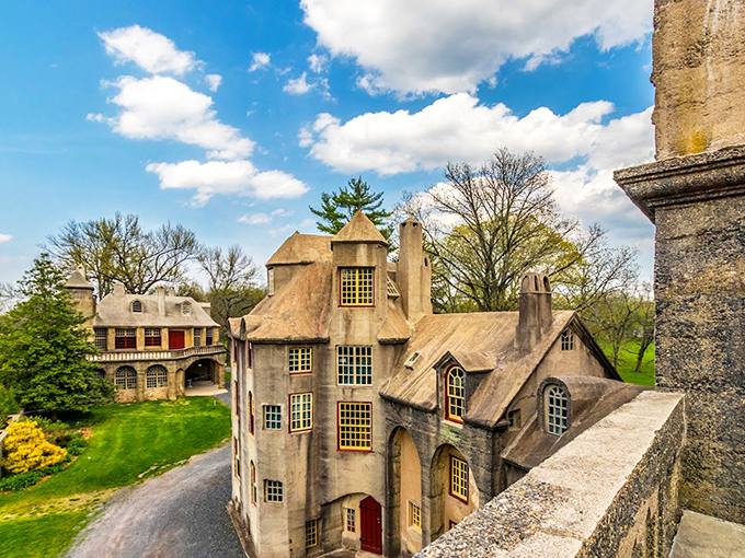 The castle's exterior reveals its unusual silhouette against pristine blue skies. Not your grandmother's castle, unless your grandmother was extraordinarily eccentric.