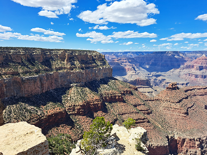 Nature's masterpiece unfolds in layers of red, orange, and purple. The Grand Canyon's vastness makes even the most jaded travelers whisper "wow" despite themselves. 