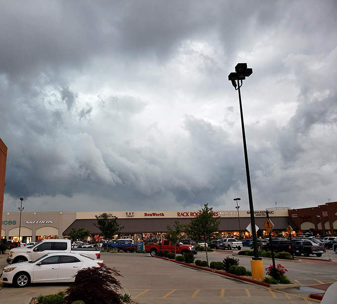Mother Nature's dramatic backdrop adds theatrical flair to your shopping adventure. Even the clouds seem to gather in anticipation of spectacular savings.