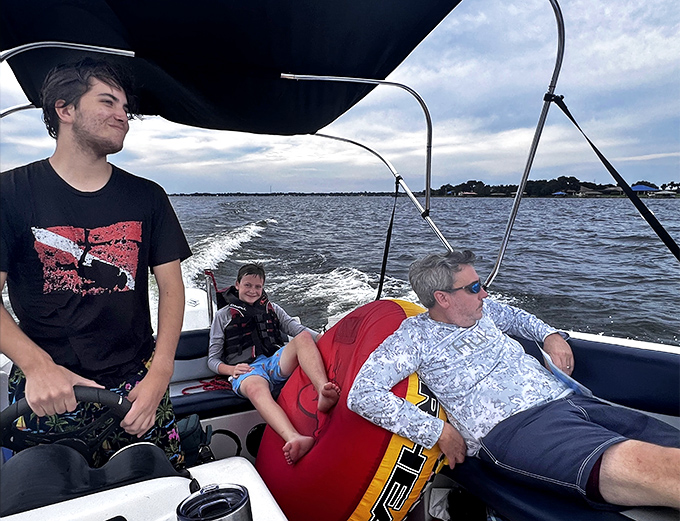 Boating on Lake June-in-Winter &ndash; where people enjoy Florida's natural splendor without a single Mickey Mouse ear in sight.
