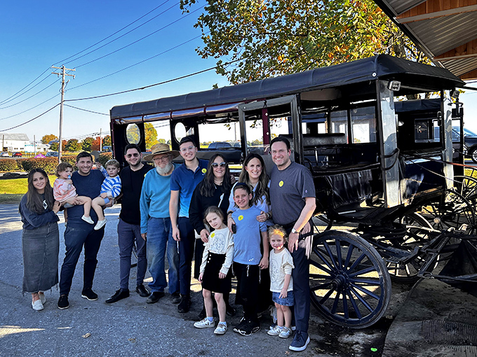 A family moment frozen in time&mdash;generations gathering to experience a slice of Amish country together beside their temporary horse-drawn chariot.