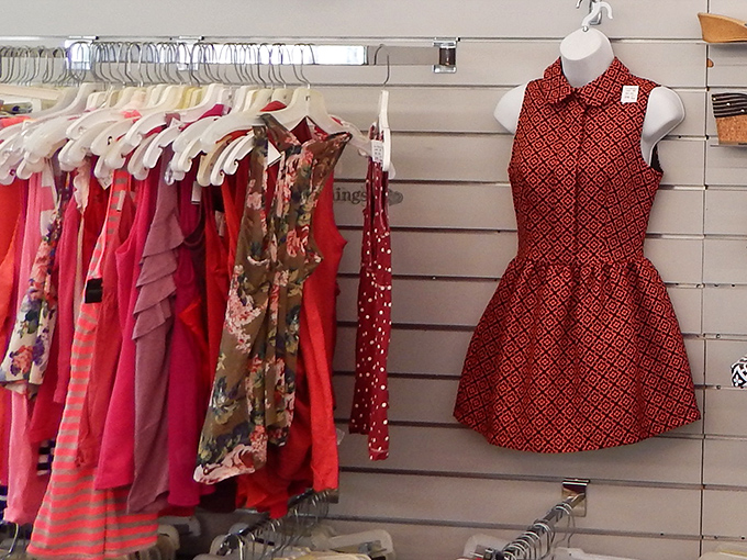 That red dress on the mannequin is giving major vintage vibes without the vintage price tag attached.