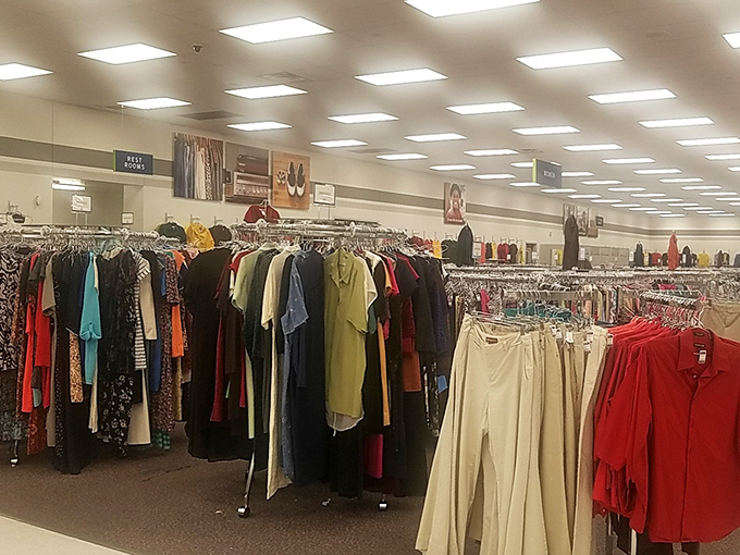 Color-coded clothing racks stretch toward the horizon, creating a rainbow road that would make Mario Kart enthusiasts jealous.