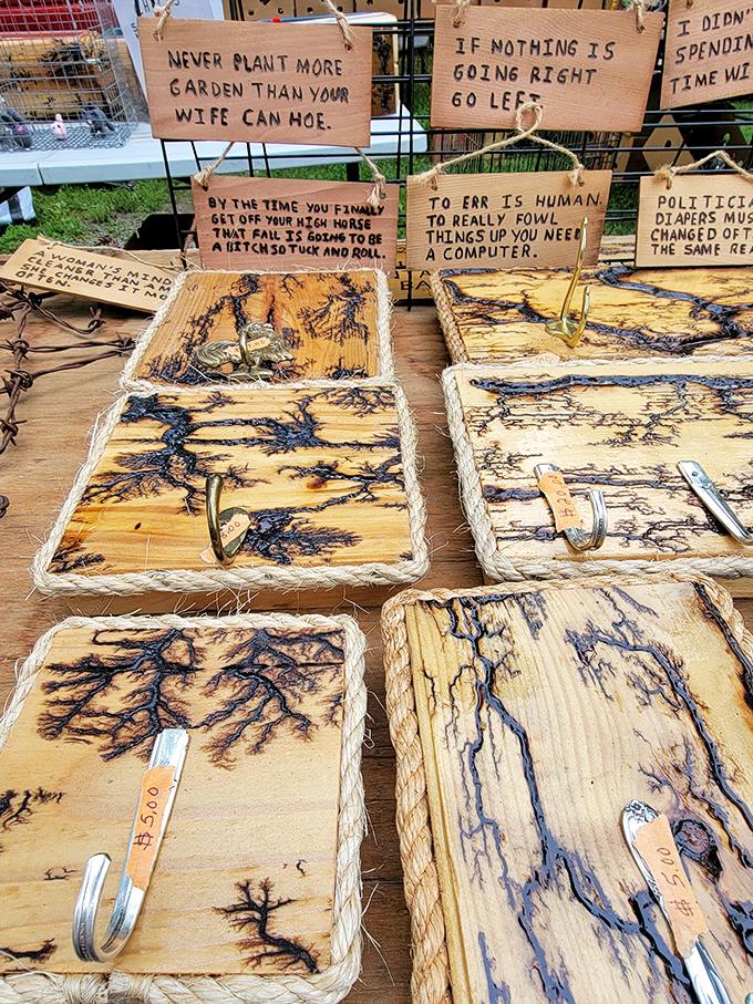 These wooden boards tell stories through electricity's path, creating lightning-like patterns that turn functional hooks into wall art.