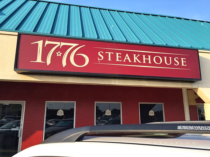 The 1776 Steakhouse sign glows with patriotic promise &ndash; liberty and juicy steaks for all!