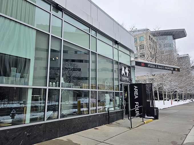 Area Four's sleek, modern facade in Cambridge's tech hub &ndash; where pizza science meets delicious art.