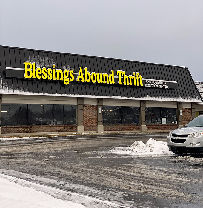 Blessings Abound indeed&mdash;that cheerful yellow sign promises sunshine for your wallet even on snowy days.
