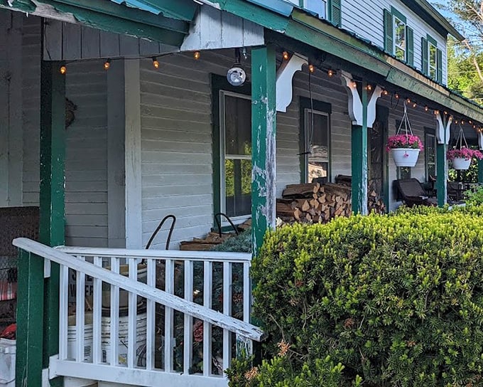 Stacked firewood on the porch means someone's doing things the old-fashioned way, which bodes well for your upcoming meal.