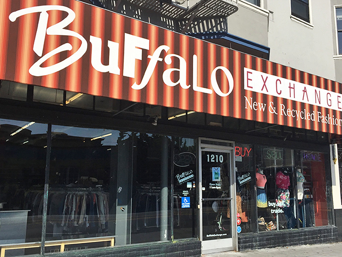 Buffalo Exchange's retro-cool storefront brings vintage vibes to Valencia Street. That striped awning promises curated fashion finds rather than thrift store chaos.