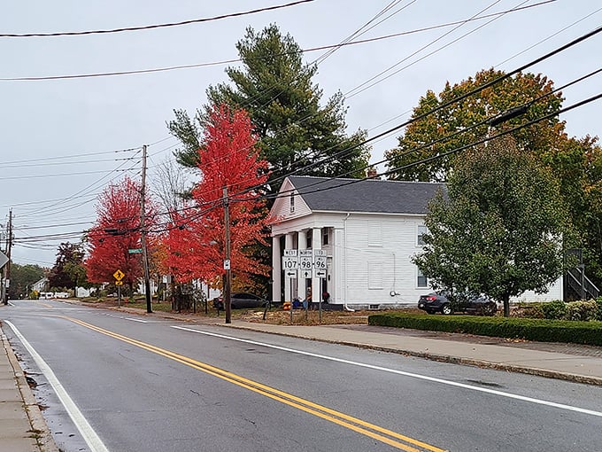 White columns and crimson leaves&mdash;Burrillville's historic charm stands proudly at this crossroads, like a dignified elder statesman refusing to change with the times.