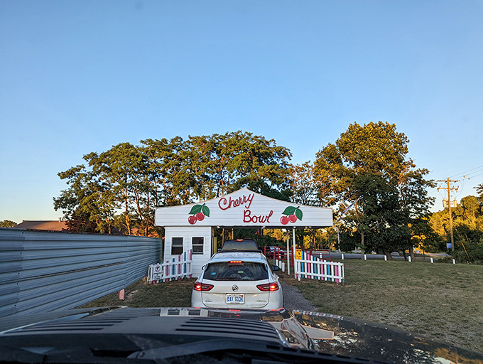 Cherry Bowl's charming entrance welcomes movie lovers with a splash of color and nostalgia. Those cherries aren't just for decoration!