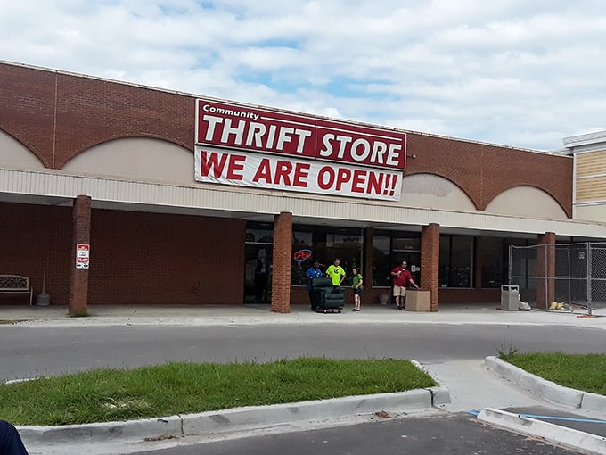 "WE ARE OPEN!!" shouts the banner, inviting bargain hunters into this unassuming community treasure chest.