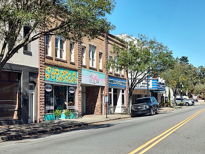 Conway's historic buildings stand shoulder to shoulder like old friends. That colorful mural adds a splash of modern creativity to the traditional brick backdrop.