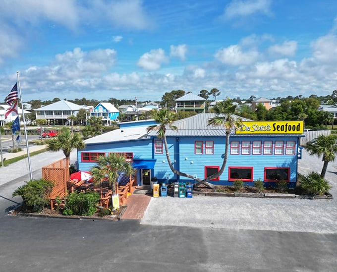 This bright blue beacon proves that sometimes the most colorful exteriors hide the most authentic experiences.