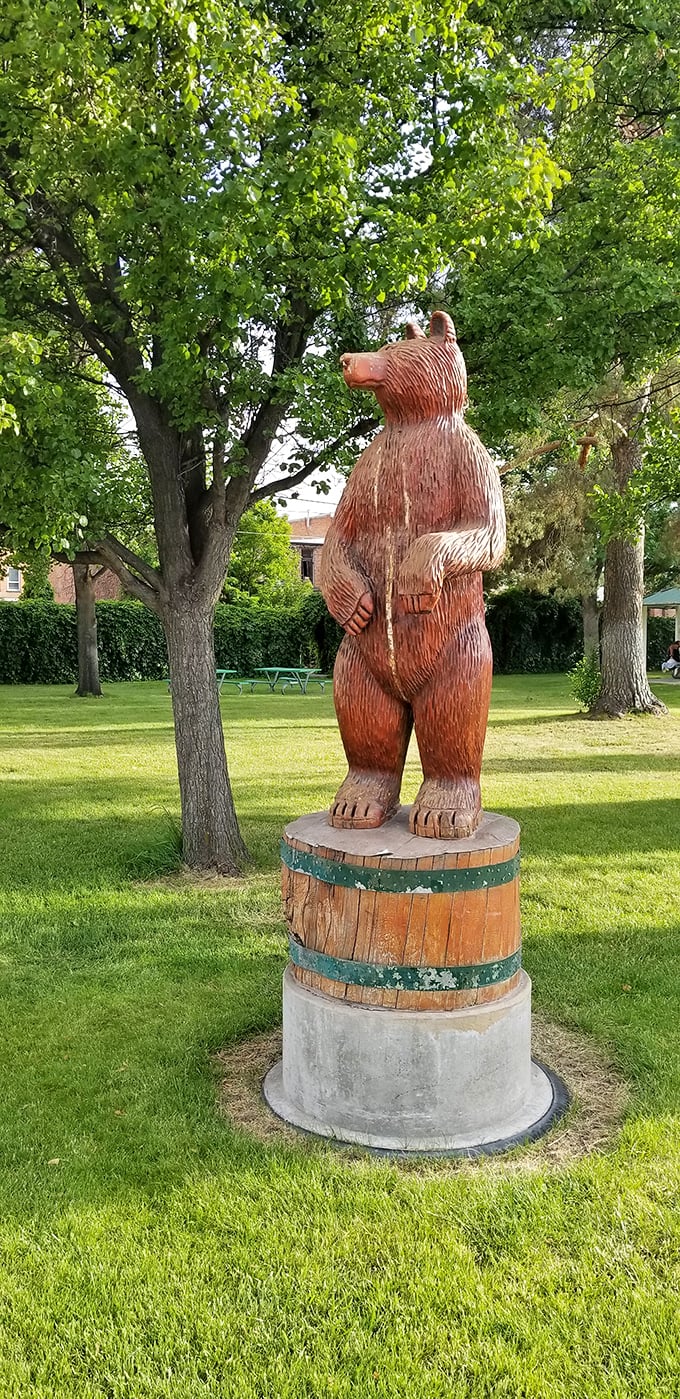 This wooden bear statue stands guard in Emmett's park. He's been waiting "beary" patiently for you to retire here!