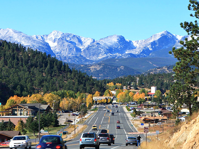 Estes Park spreads out like a welcome mat at the foot of snow-capped Rocky Mountain majesty.