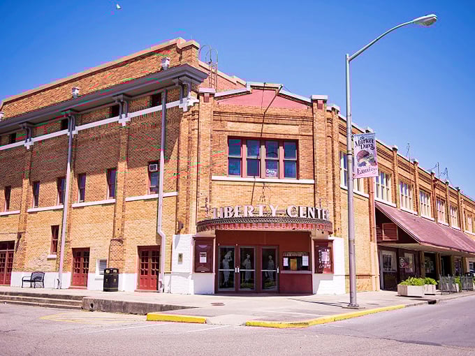 The Liberty Theatre in Eunice stands like a brick guardian of culture, offering entertainment that won't drain your Social Security.