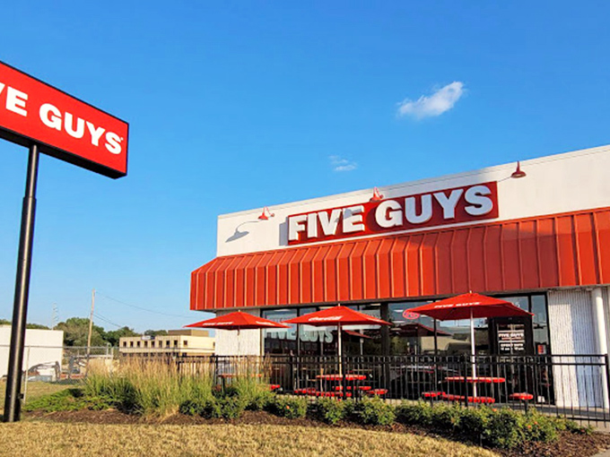 Five Guys' bright red awnings signal more than just burger territory. Their hot dogs deserve their own fan club!