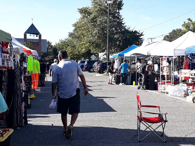 The outdoor market buzz feels like a neighborhood block party with better shopping opportunities.