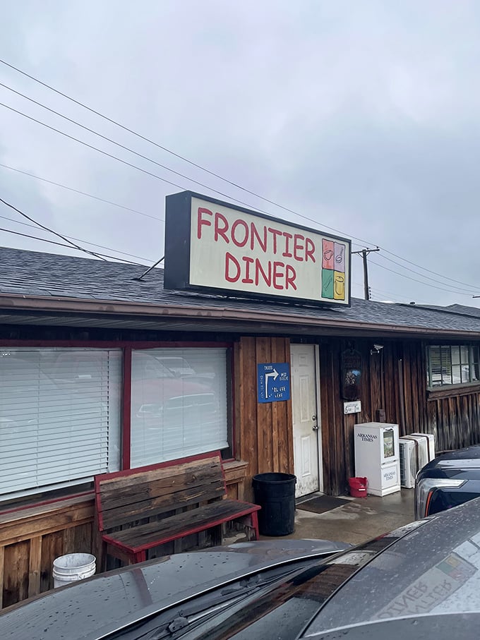 Frontier Diner (exterior): "No frills, just skills! This humble wooden exterior hides breakfast magic that locals line up for."