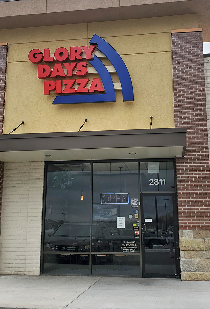Glory Days Pizza's bright sign is like a beacon for the pizza-obsessed. Your diet plan's kryptonite has been located!