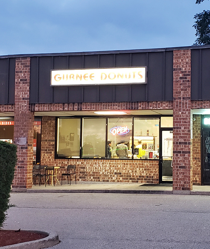 Gurnee Donuts glows with late-day promise &ndash; when the "OPEN" sign is the most beautiful word in the English language.