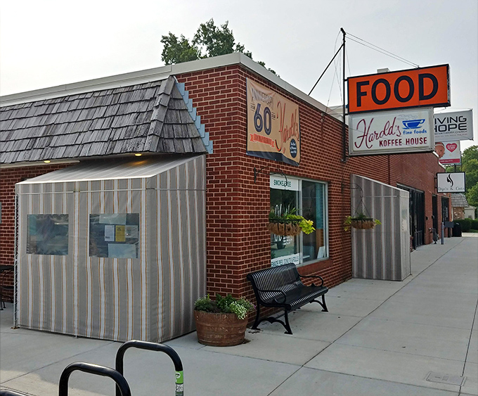 That classic brick and neon combo signals serious breakfast business happening inside these welcoming walls.