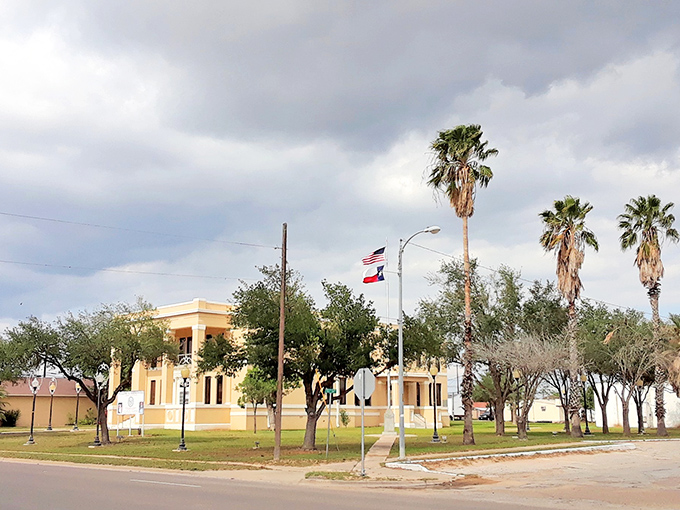 Hebbronville's courthouse stands proudly under South Texas skies, surrounded by palm trees and housing prices from another era.