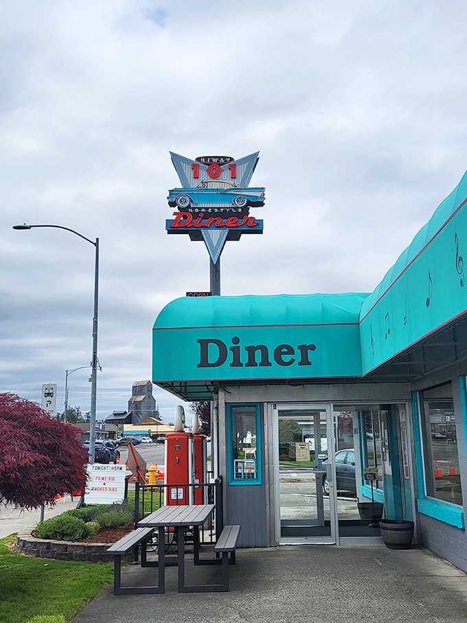 The turquoise beacon of Hi-Way 101 Diner calls to hungry travelers like a 1950s mirage promising breakfast salvation.