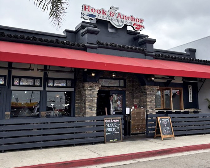 The stone facade whispers "neighborhood tavern" but the lobster inside shouts "hidden culinary treasure" at the top of its lungs.