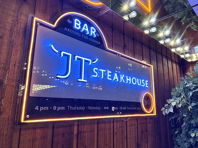 JT's blue neon sign cuts through the desert night, a modern-day oasis for the steak-starved traveler.