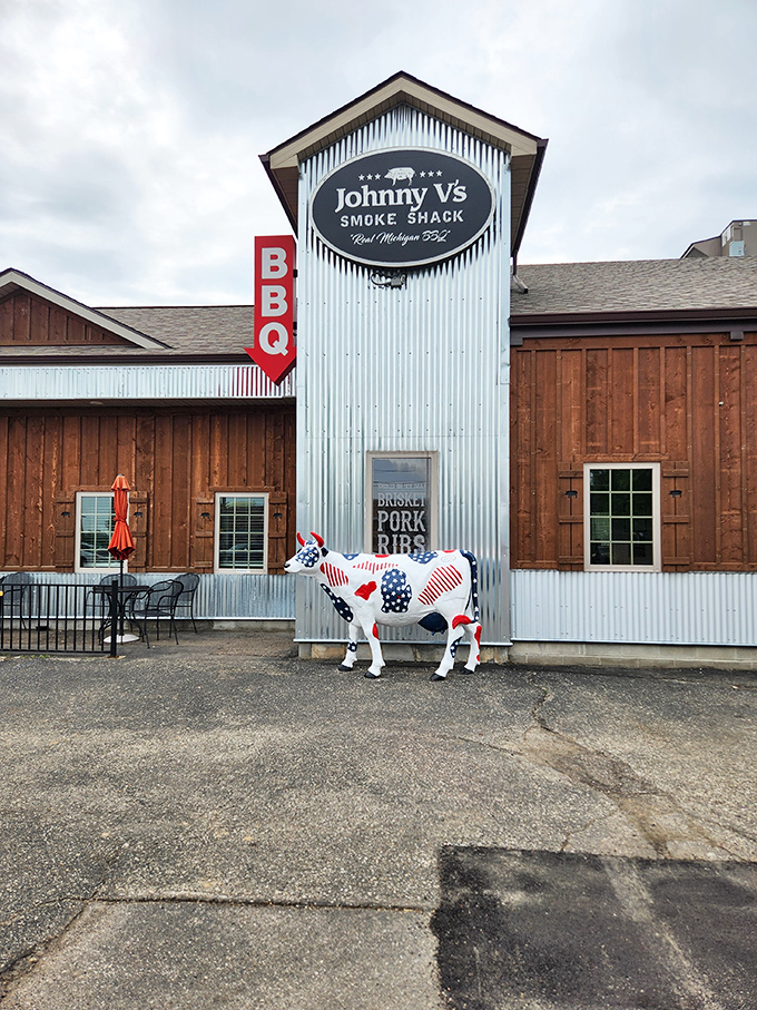 Johnny V's rustic charm comes complete with a patriotic cow guardian &ndash; because great BBQ deserves a proper mascot.