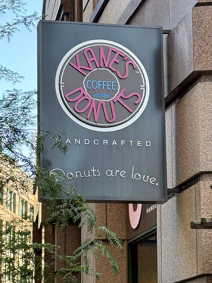 Kane's circular pink sign declares "Donuts are love" &ndash; a philosophy that's hard to argue with after tasting their creations.