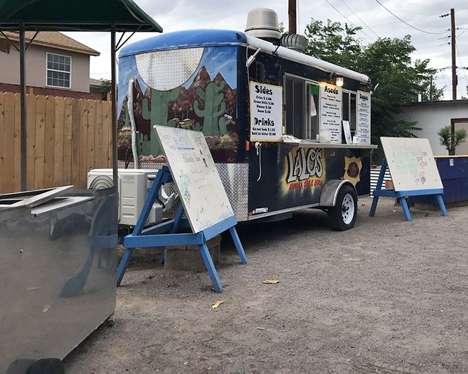 This blue food trailer looks like it rolled straight out of a street food lover's dream, ready to serve.