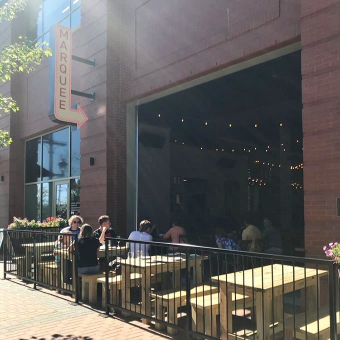 Marquee's inviting patio &ndash; where pizza becomes an event. Those string lights aren't the only things glowing with warmth here.