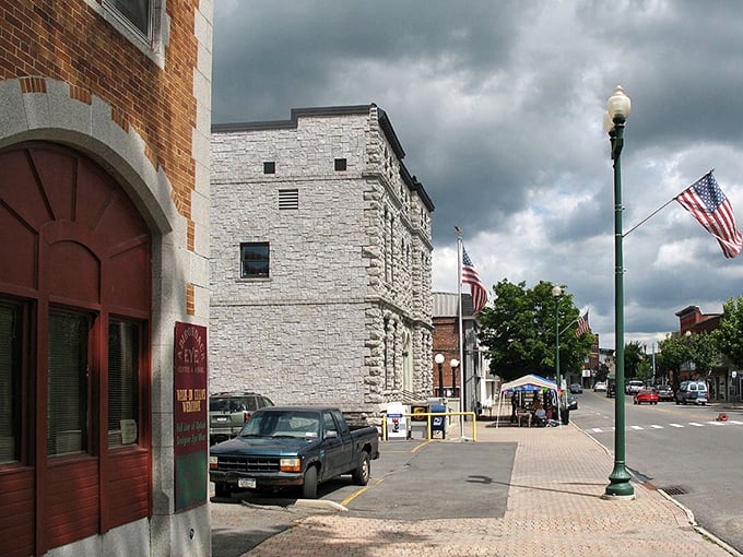 Massena's solid brick downtown stands strong by the river, offering honest small-town living without the fancy price tags.