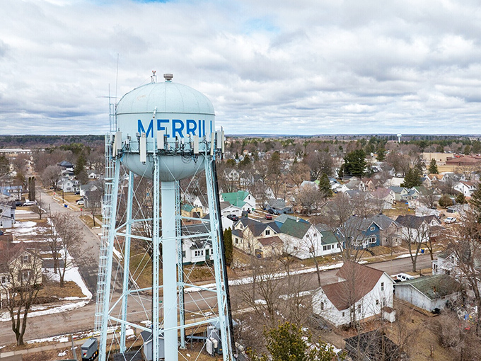 Merrill's distinctive blue water tower watches over a town where housing costs run nearly half the national average.