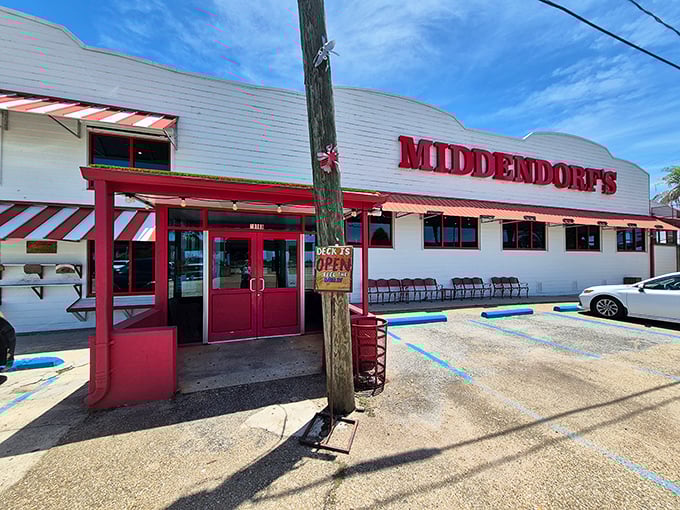 Middendorf's white-and-red charm! Where thin-fried catfish has been making Louisianans swoon since before your grandparents' first date.