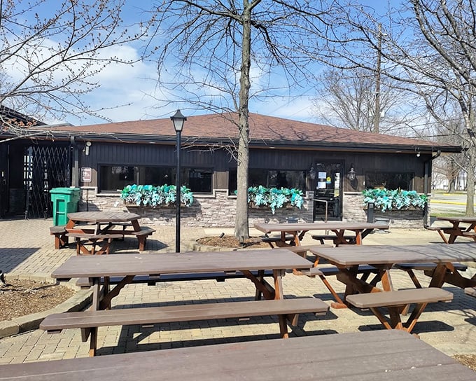 Picnic tables under shade trees at Mike Linnig's &ndash; where "eating outdoors" becomes an event worth putting on the calendar.