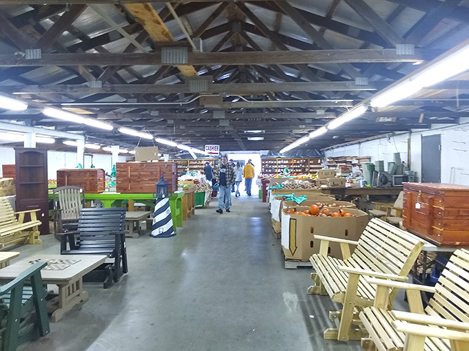 Wide warehouse aisles invite leisurely browsing through carefully curated collections of vintage American treasures.