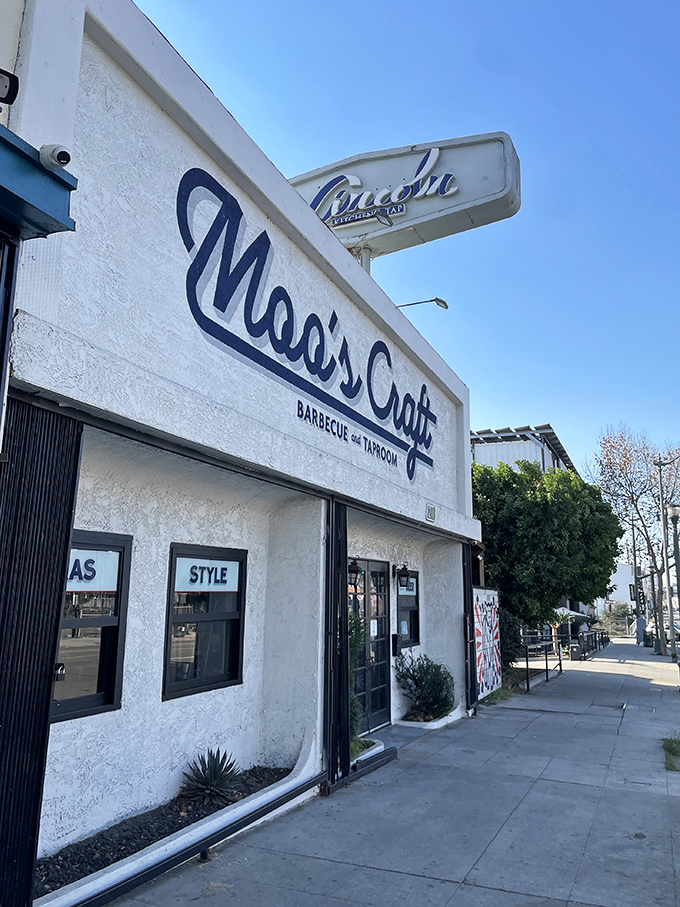 Moo's Craft Barbecue's clean white exterior belies the gloriously messy, finger-licking experience that awaits inside.