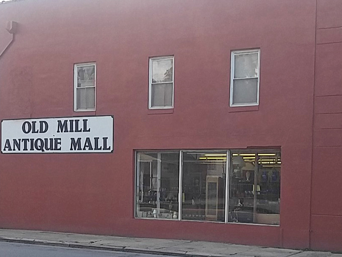 That burgundy facade holds more secrets than a soap opera - and every single one is for sale. 