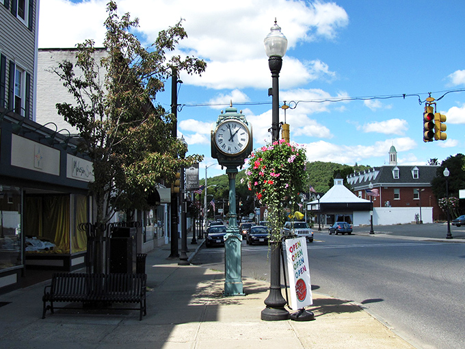 Palmer's charming downtown features a classic town clock surrounded by local businesses, offering affordable small-town living with character and convenience.