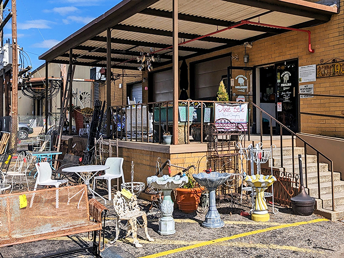 Garden treasures spill onto the sidewalk like a vintage yard sale that never ends - pure shopping bliss.